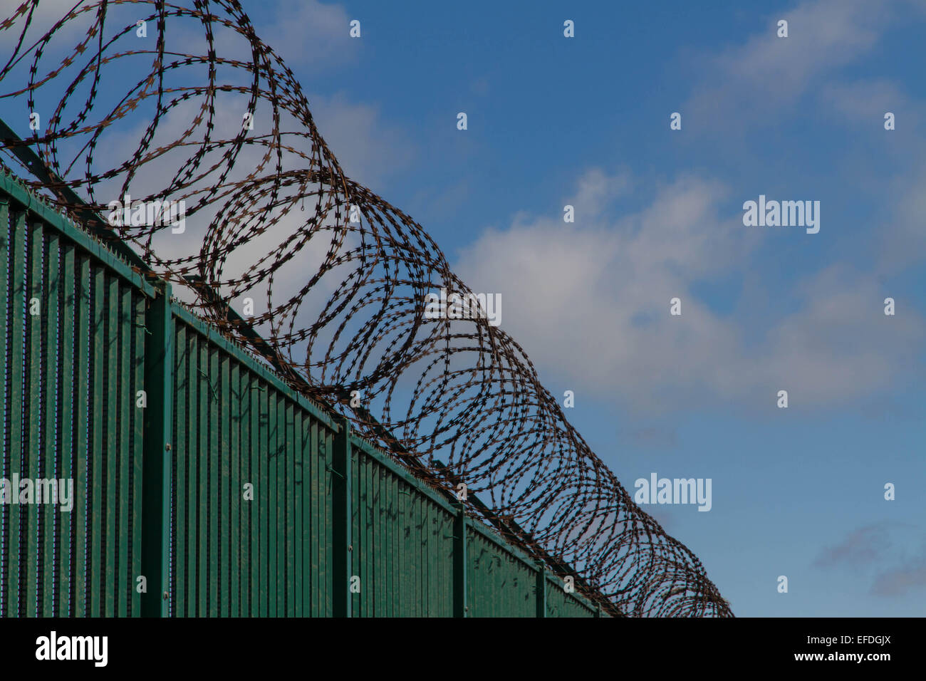 Boundary area of ferry terminal. Fence and Razor wire. Dunkirk, France ...