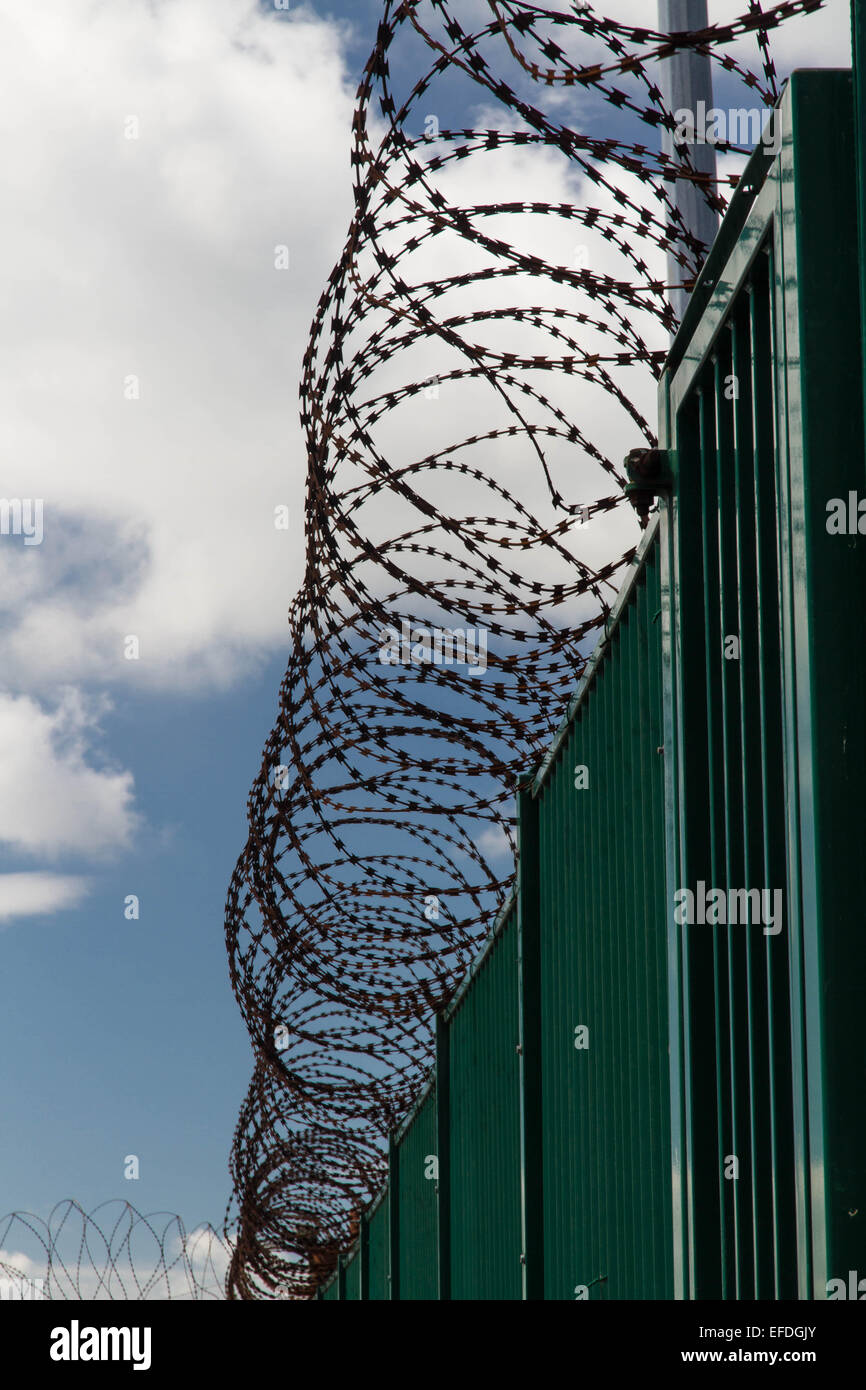 Boundary area of ferry terminal. Fence and Razor wire. Dunkirk, France ...