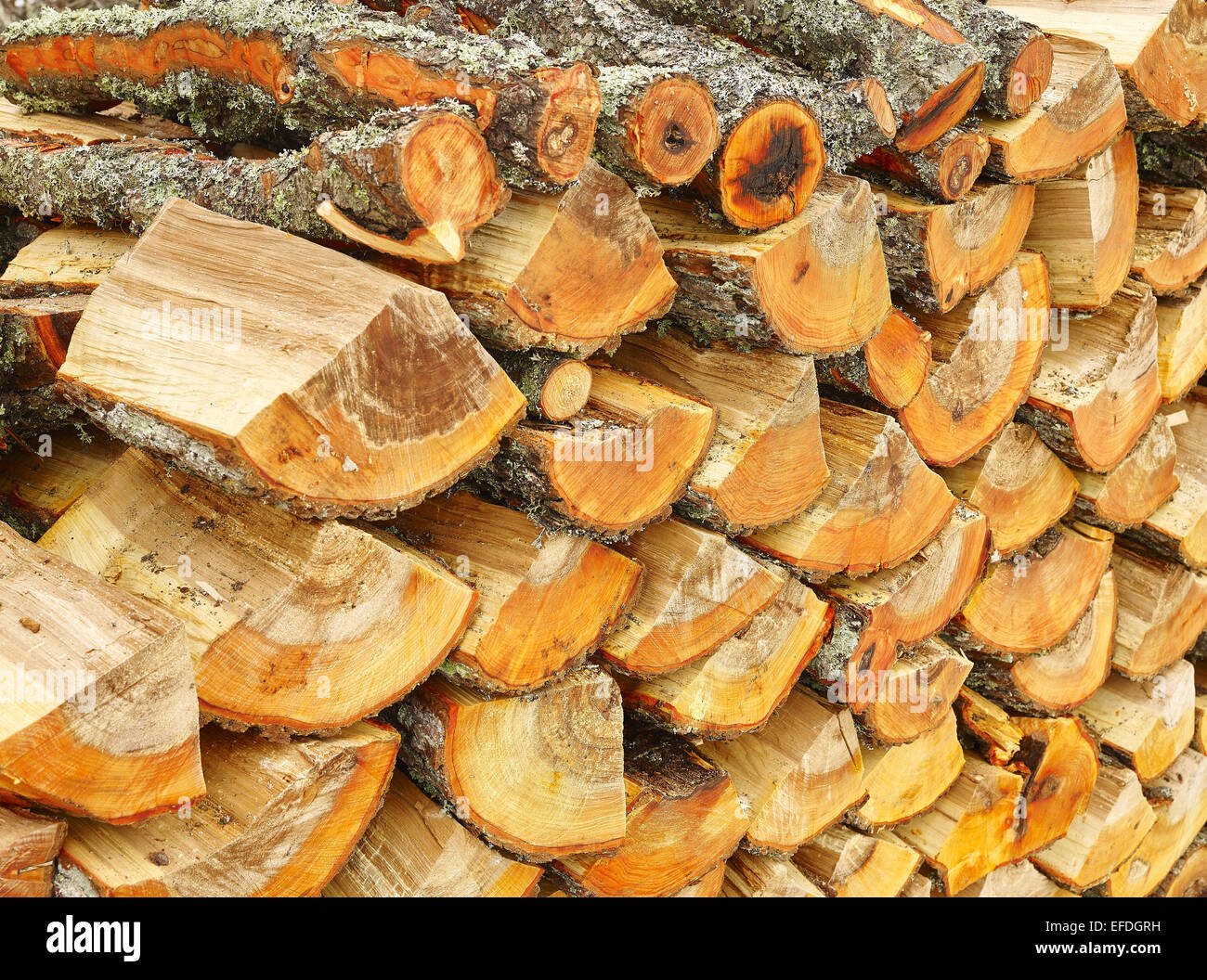 Firewood stack, logs are drying up outdoors Stock Photo - Alamy