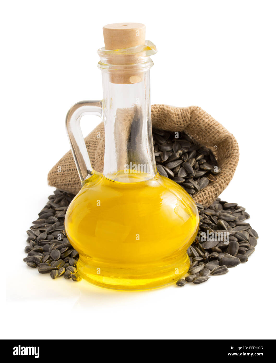 sunflower oil and seeds isolated on white background Stock Photo - Alamy
