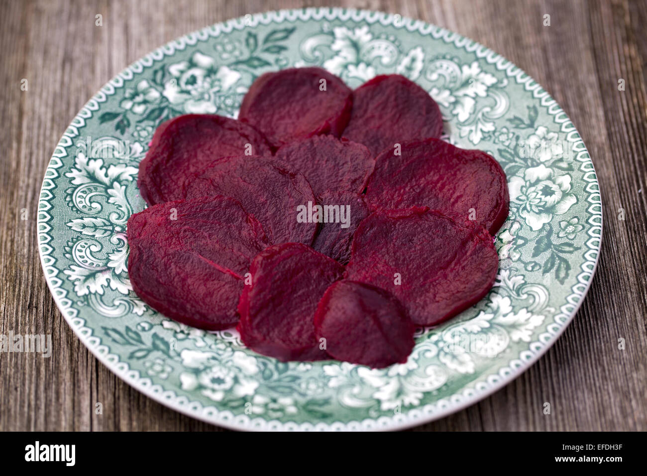 Beetroot Slices on vintage plate Stock Photo - Alamy