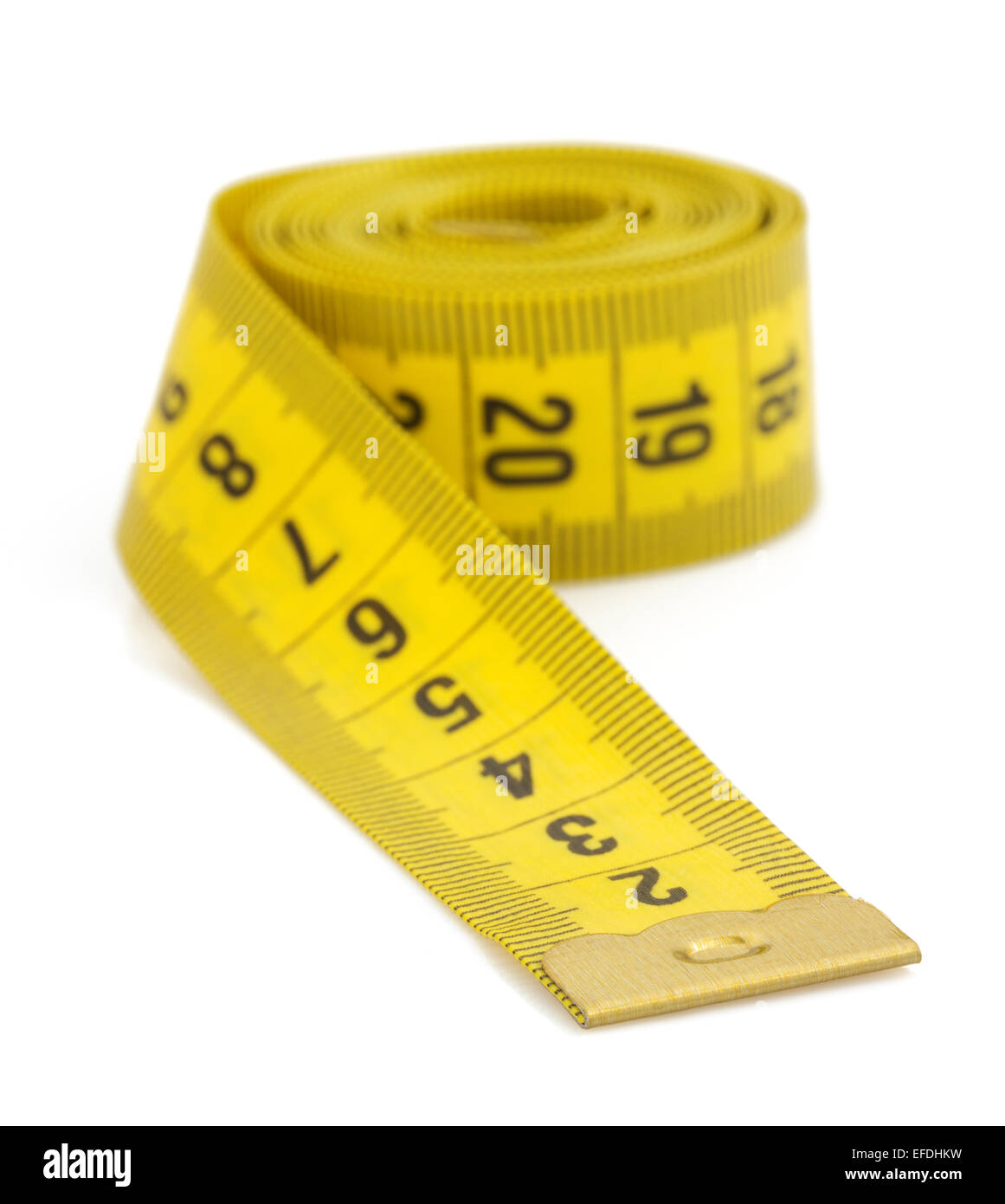 yellow measuring tape isolated on white background Stock Photo - Alamy