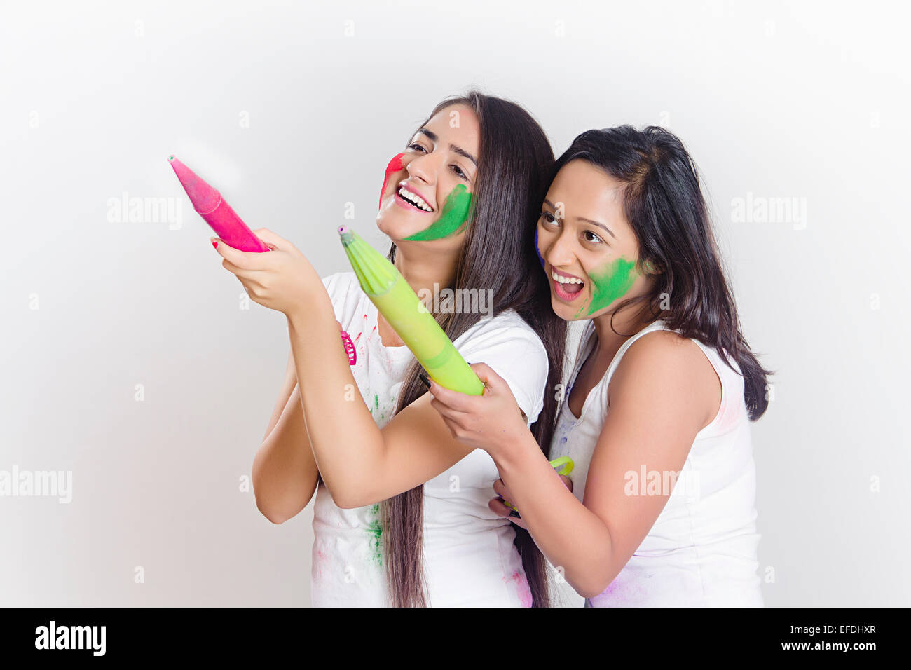 2 indian ladies Holi Festival fun Stock Photo - Alamy