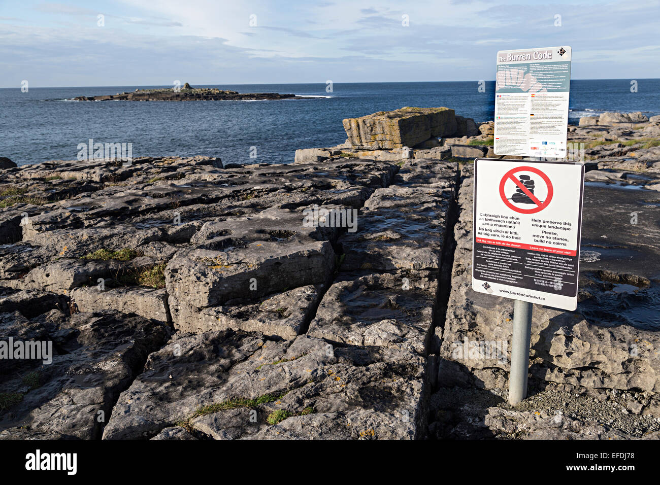 The Burren Code sign in multi languages on limestone pavement at Doolin ...