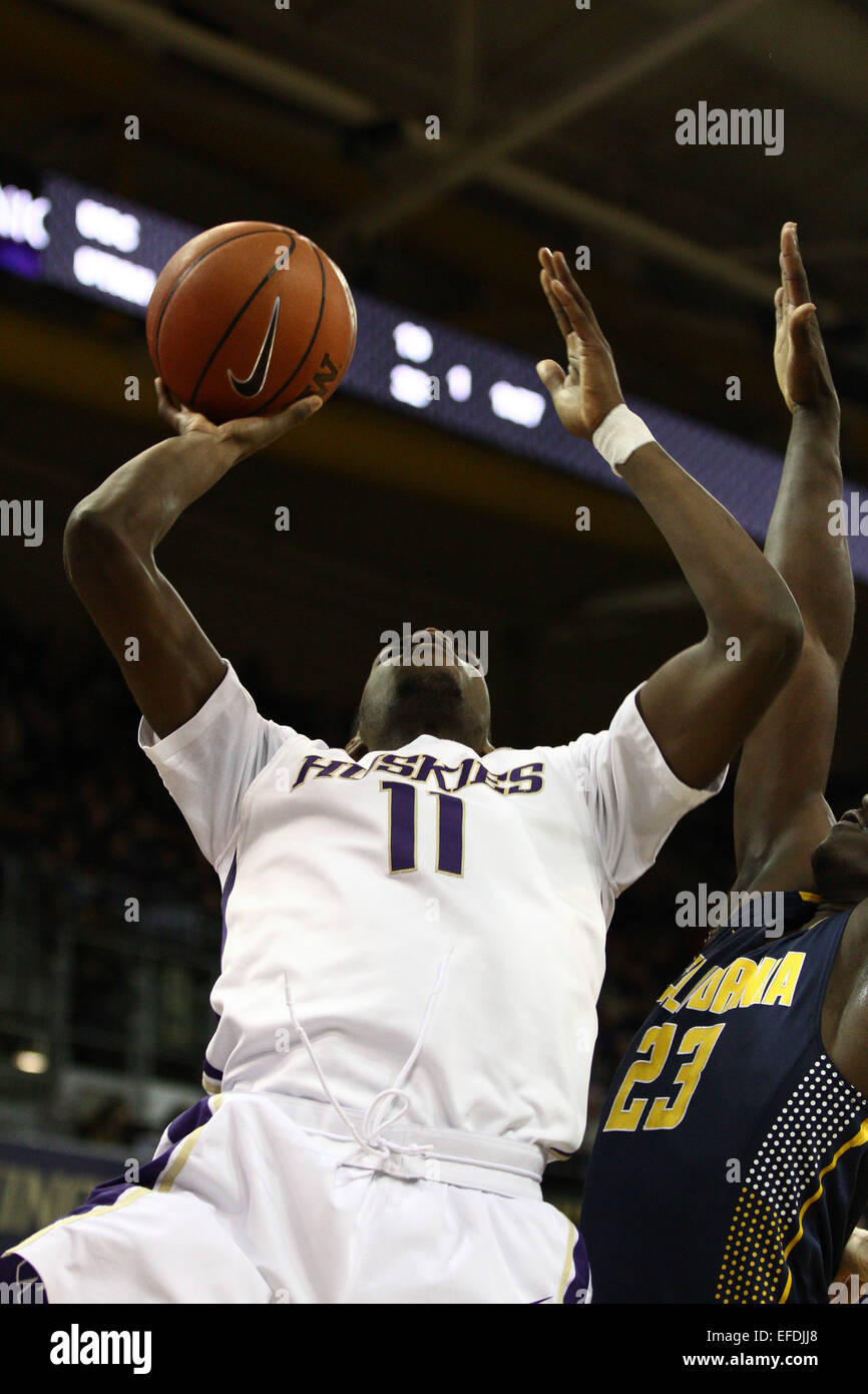 February 1, 2015: Washington's Mike Anderson drives gainst Jabari Bird ...