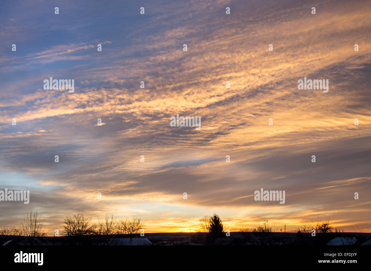 Light orange clouds at sunrise hi-res stock photography and images - Alamy