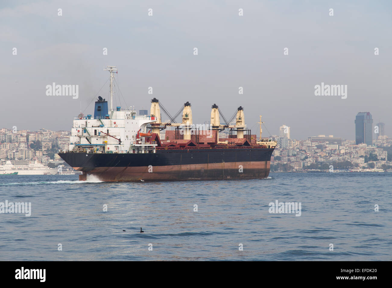 A cargo ship carrying goods between ports Stock Photo - Alamy