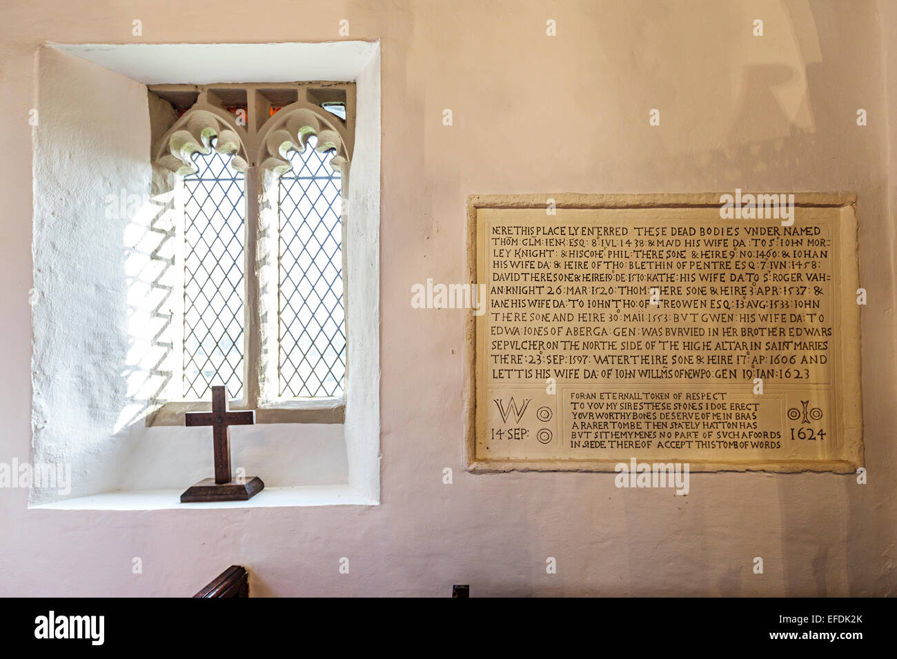 Plaque to interred bodies in St Bridget's Church, classic Norman form ...