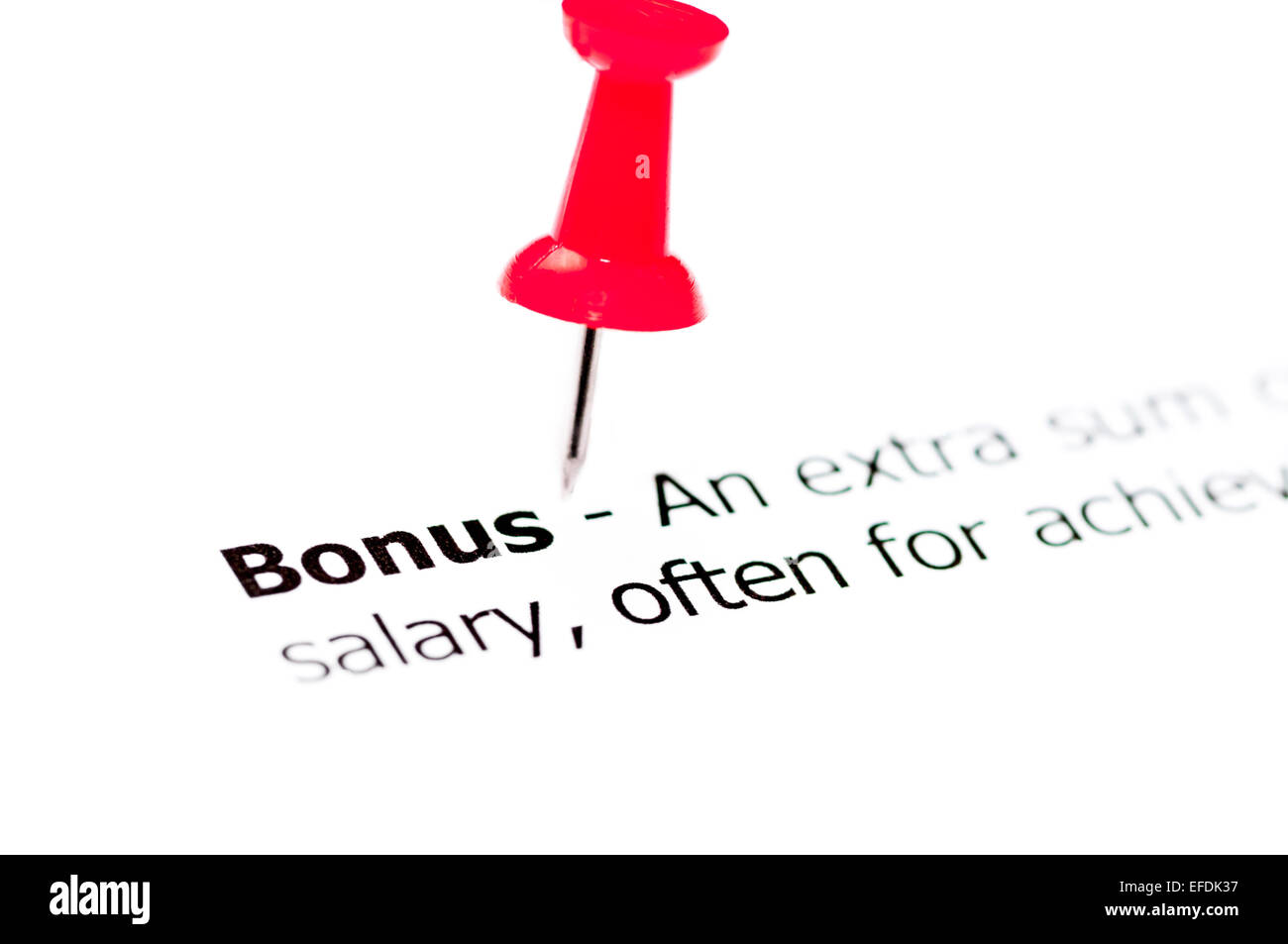 Word Bonus pinned on white paper with red pushpin, copy space available ...