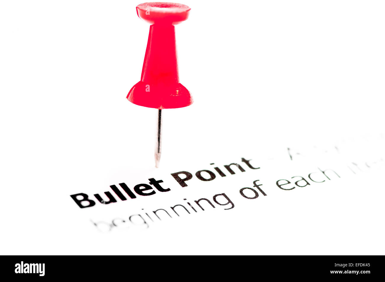 Words Bullet Point pinned on white paper with red pushpin, copy space ...