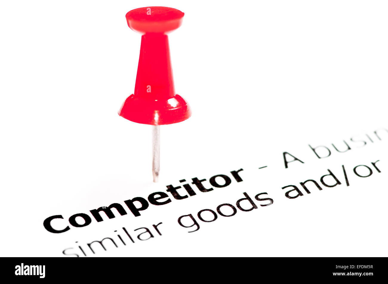 Word Competitor pinned on white paper with red pushpin, copy space ...