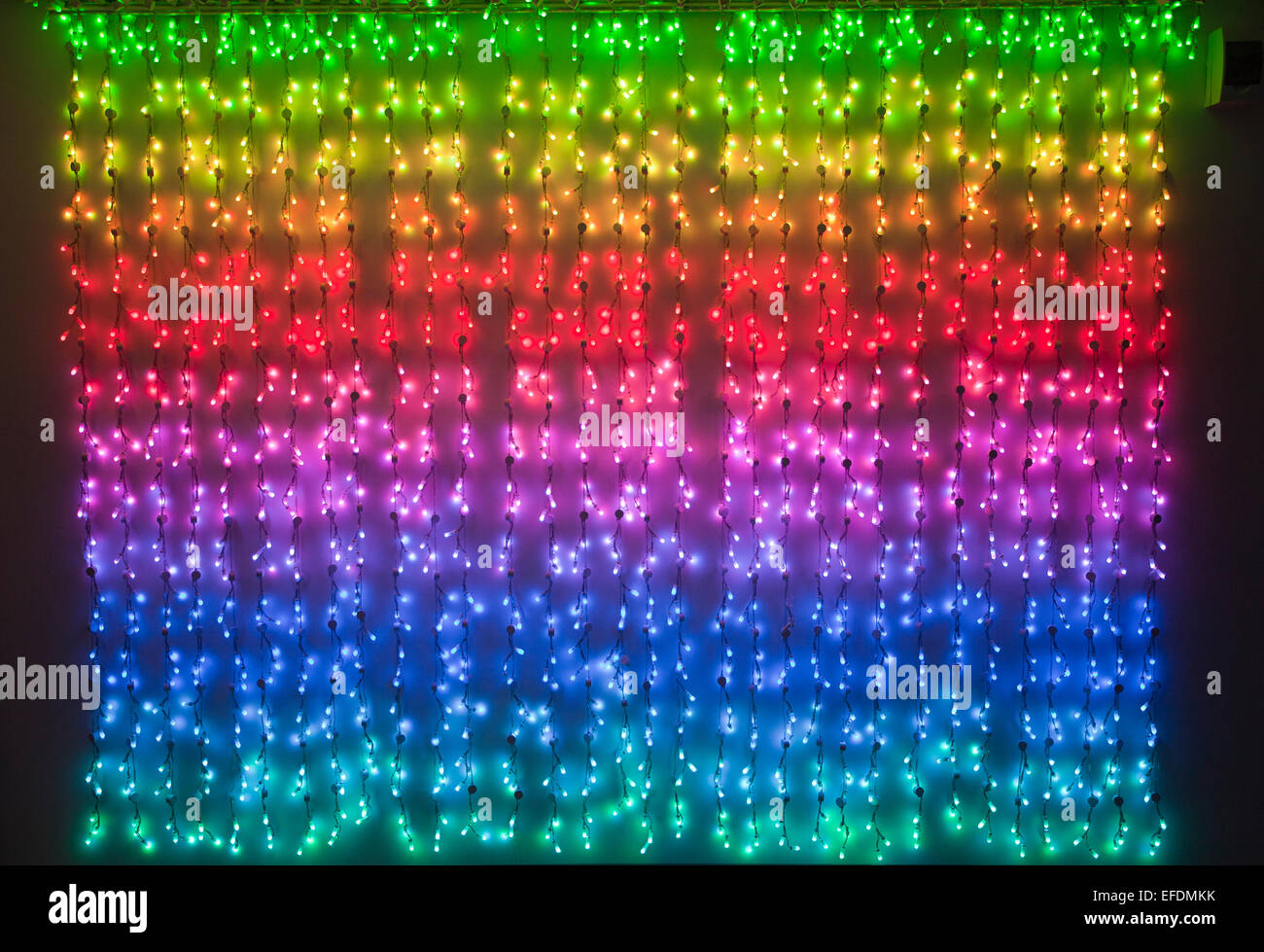 Rainbow of christmas lights as a background Stock Photo - Alamy