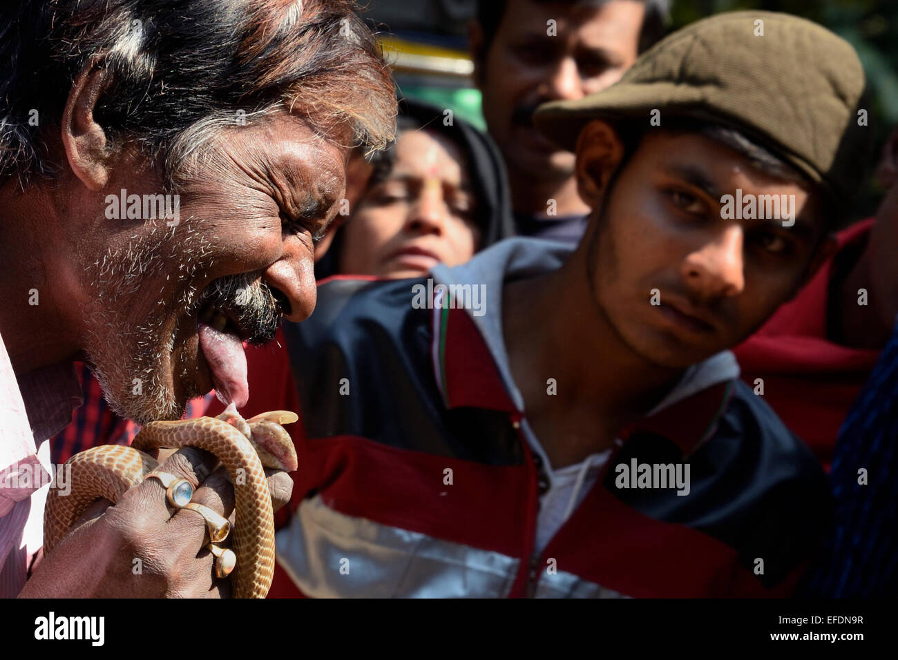 Snake Charmer and activist Mr. Mal showing his snake trick and earning ...