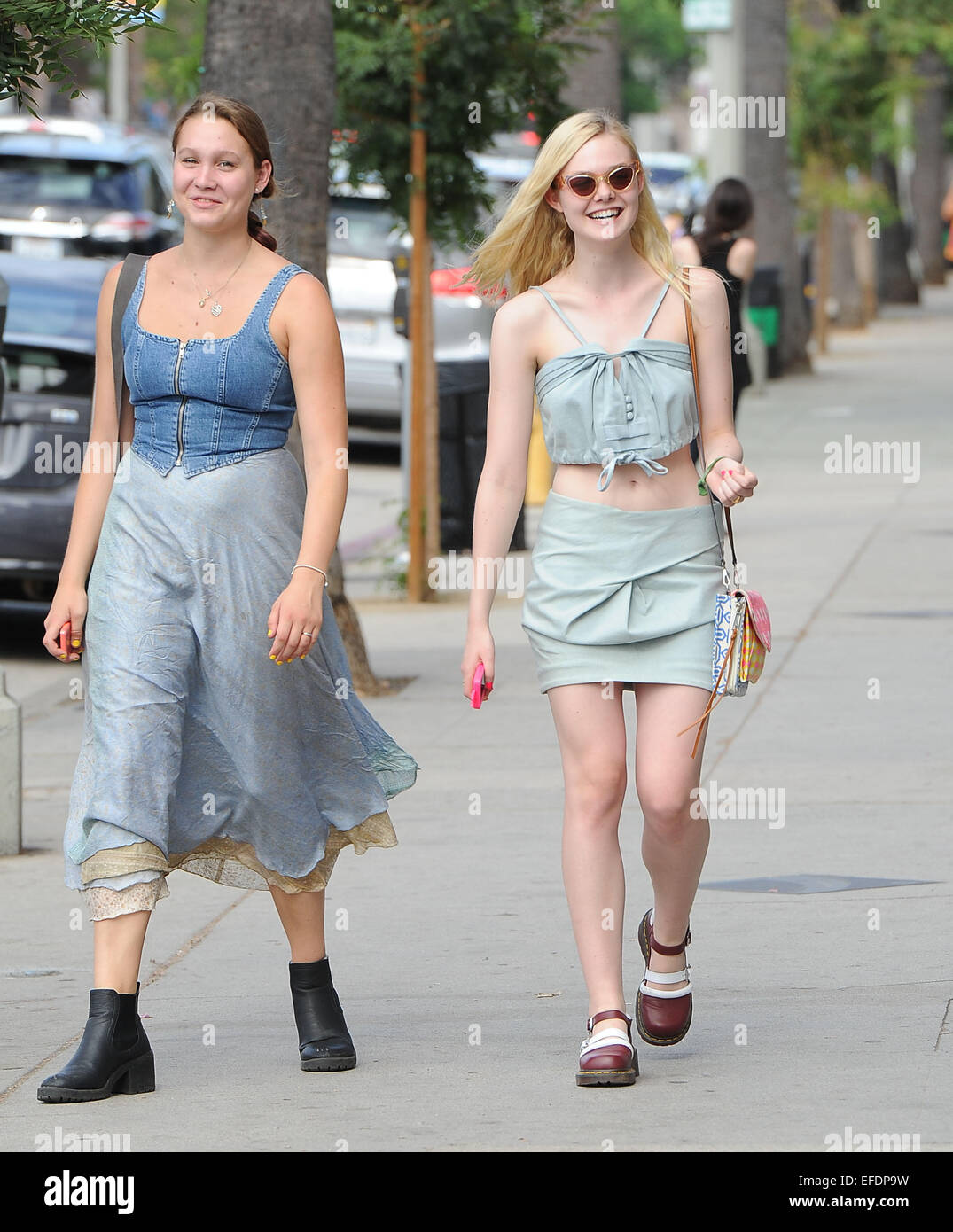 Elle Fanning carries a colorful bag while out and about having some ...