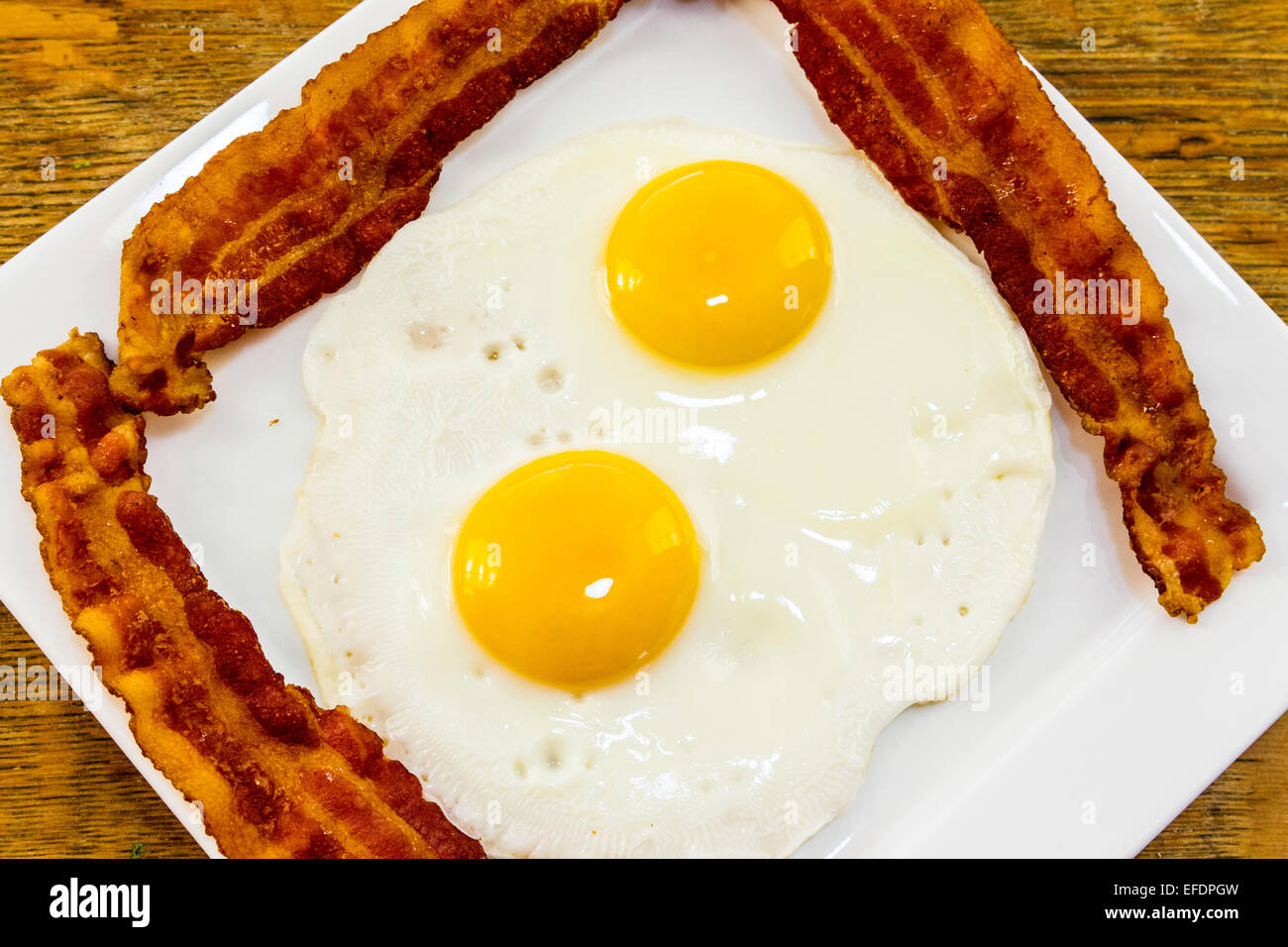 Cooking bacon scrambled eggs hi-res stock photography and images - Alamy