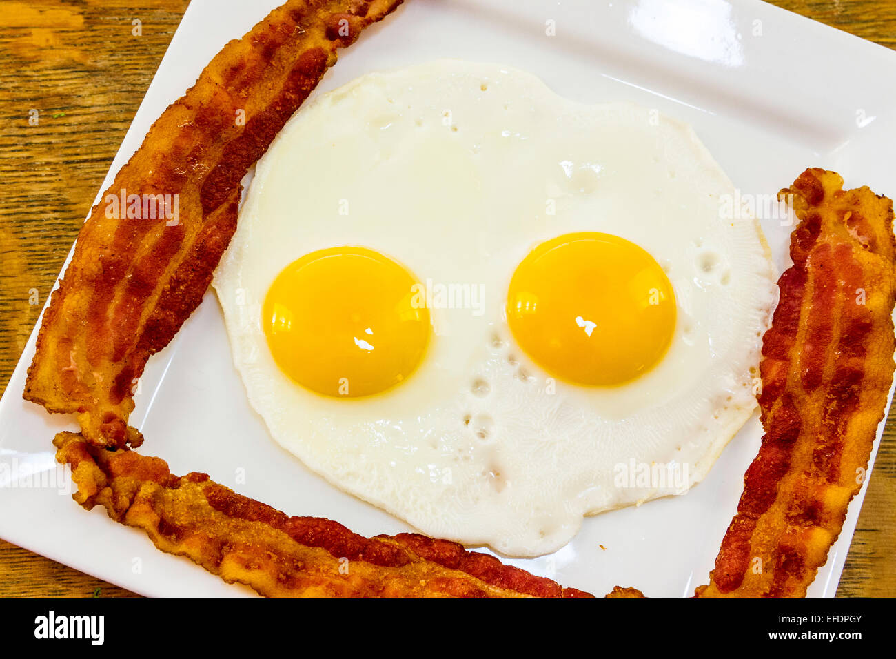 Cooking bacon scrambled eggs hi-res stock photography and images - Alamy