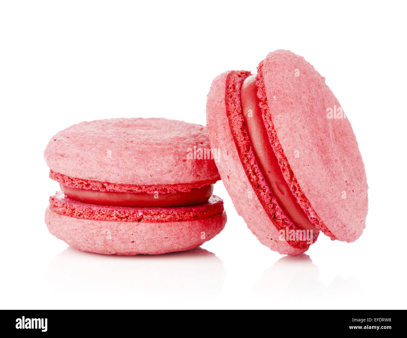 Pink macarons. Isolated on white background Stock Photo - Alamy