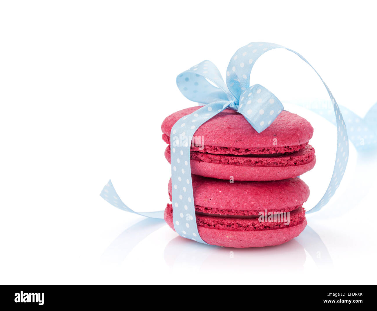 Red macarons with blue ribbon. Isolated on white background Stock Photo ...