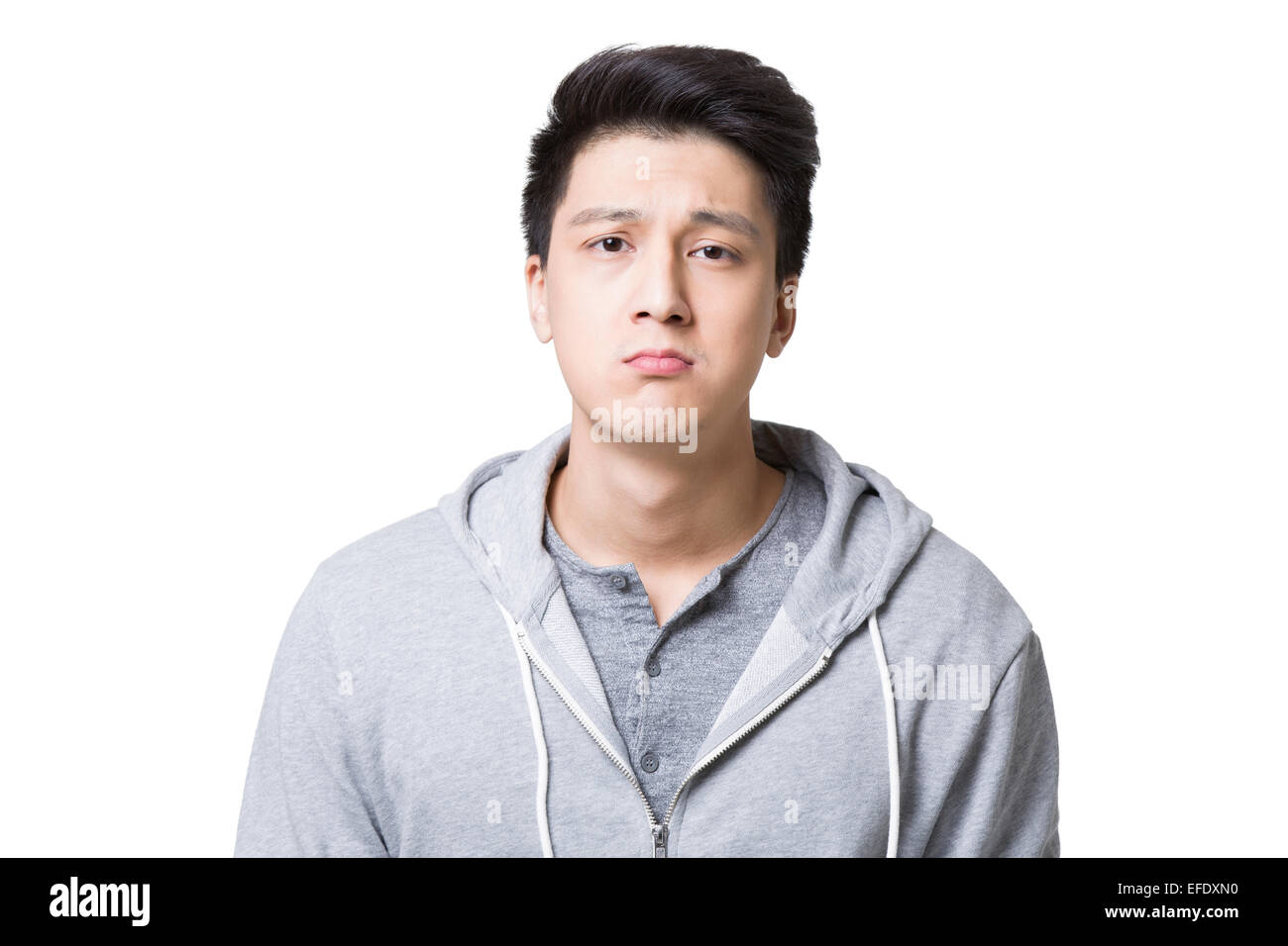 Young man with sad expression Stock Photo - Alamy
