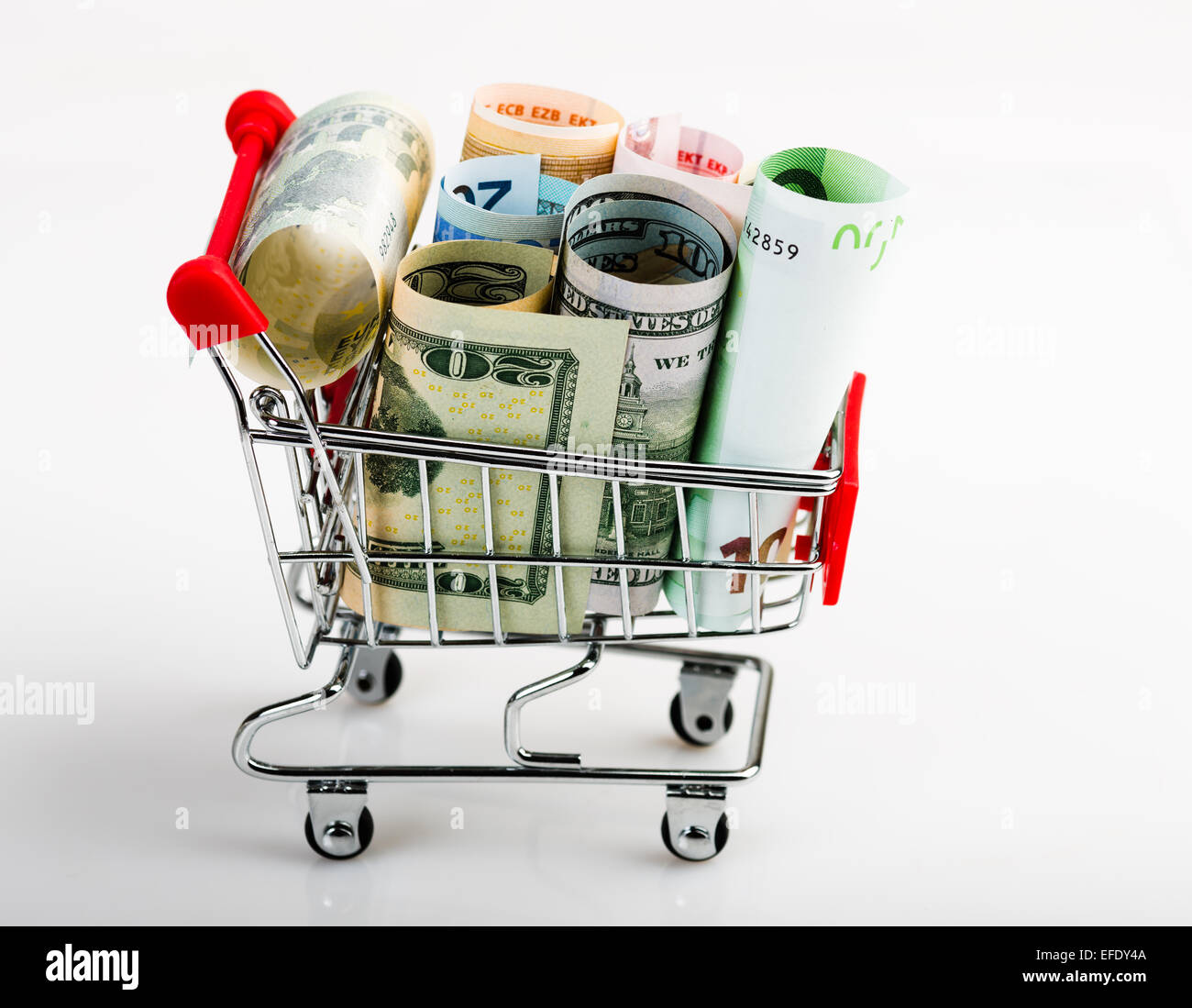 Shopping cart full of money (dollar, euro). Multi currency basket ...