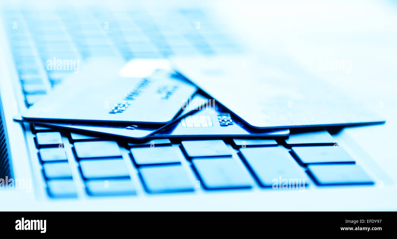 Credit card on laptop keyboard Stock Photo - Alamy