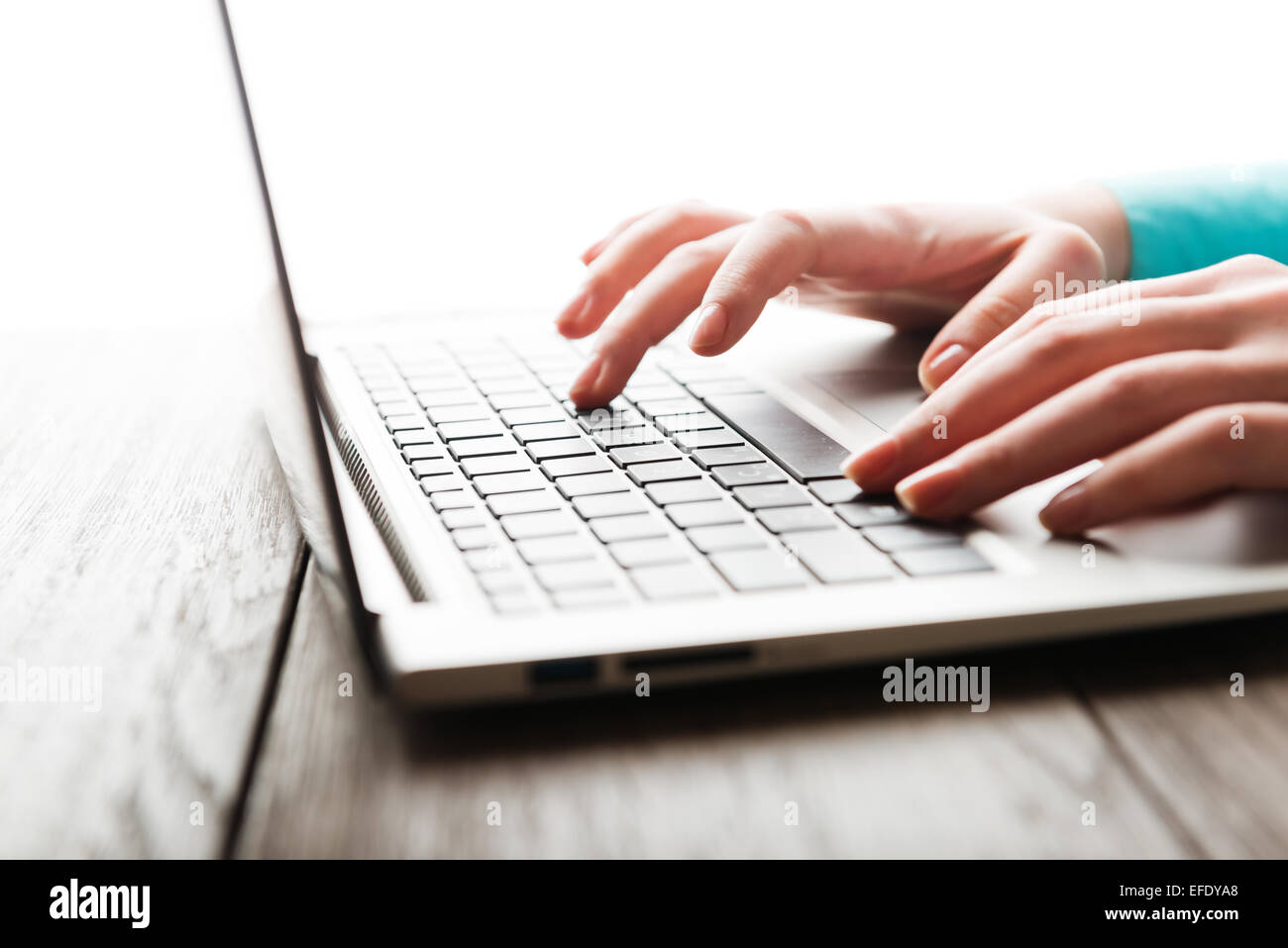 Human hands working on laptop Stock Photo - Alamy