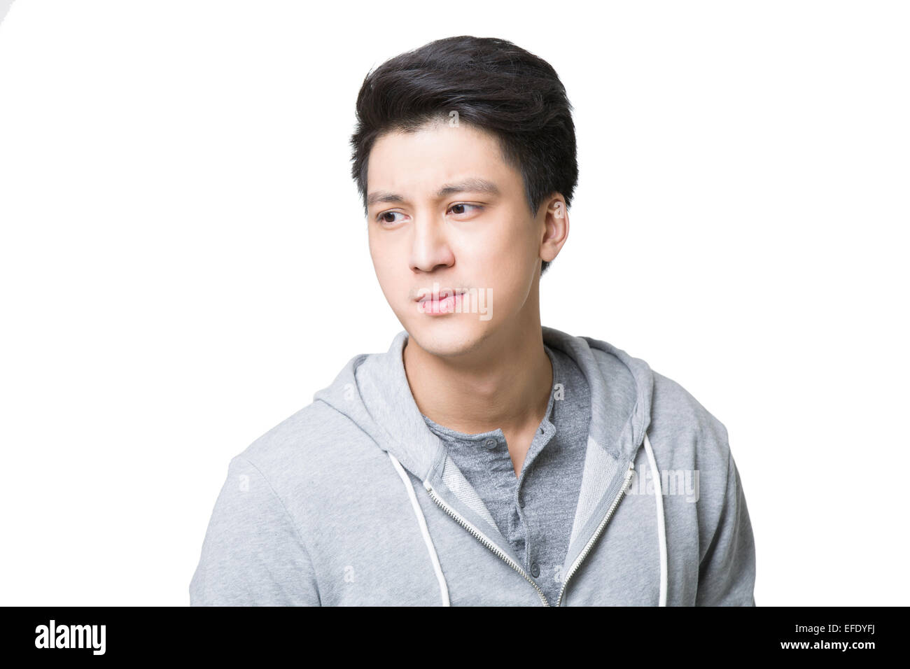 Young man with sad expression Stock Photo - Alamy