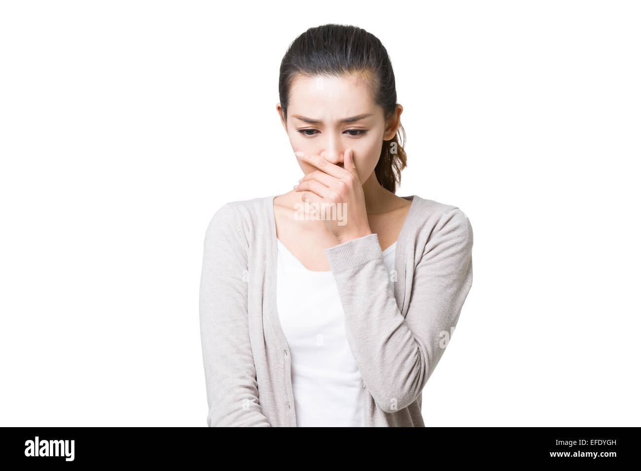 Young woman with sad expression Stock Photo - Alamy