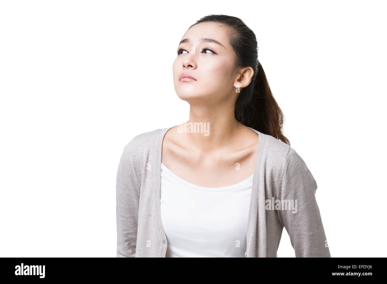 Young woman with sad expression Stock Photo - Alamy