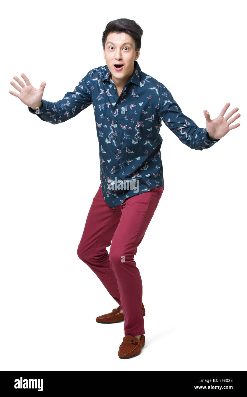 Surprised young man Stock Photo - Alamy