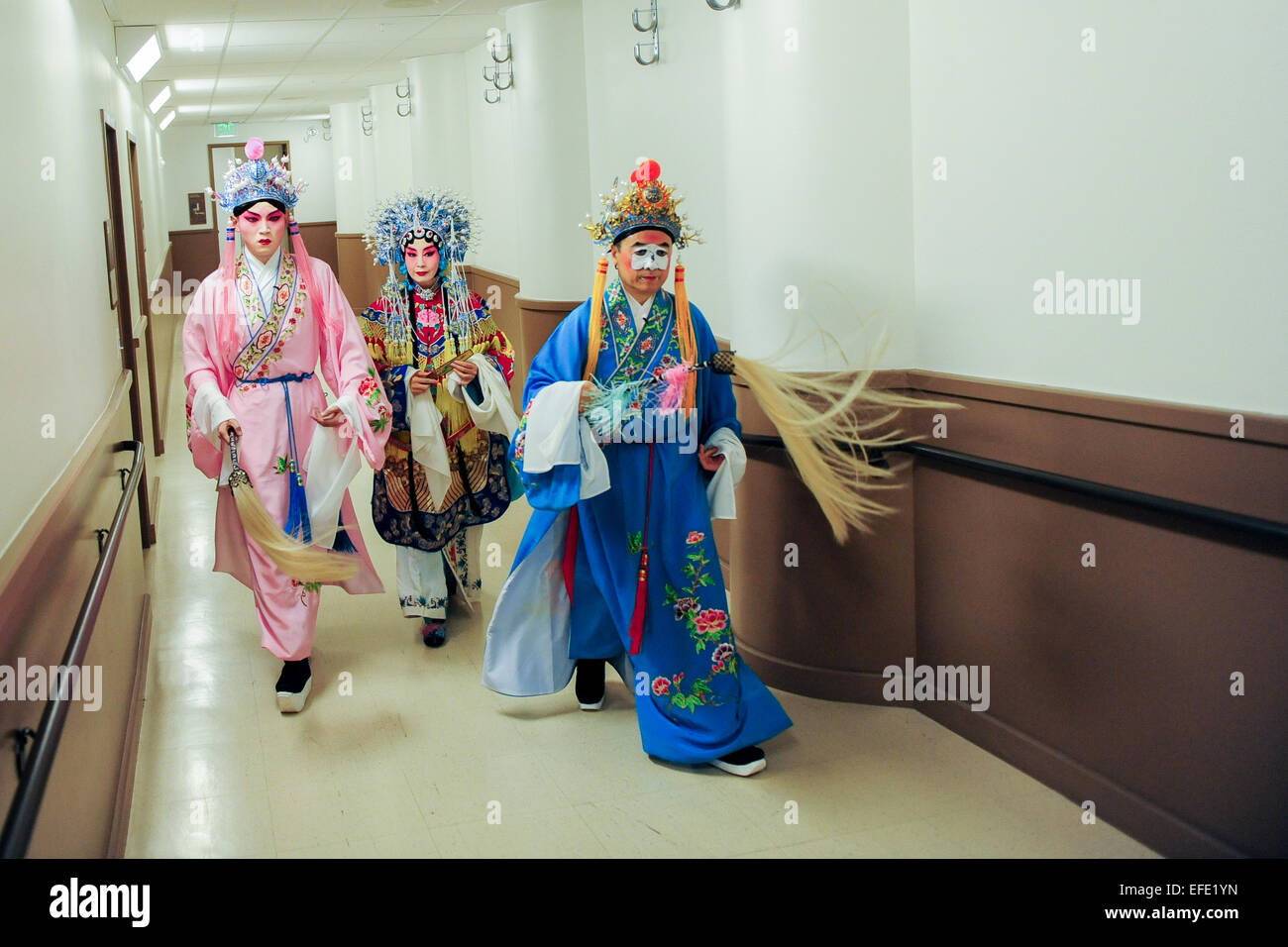 Los Angeles, USA. 31st Jan, 2015. Chinese artist Sun Ping (2nd L) walks ...