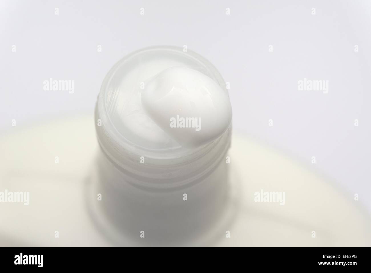 face cream on top of bottle dispenser Stock Photo - Alamy