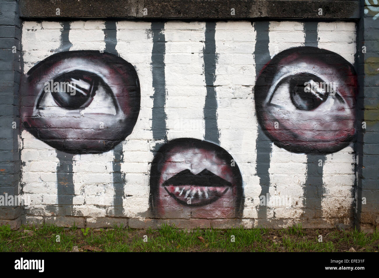 Funny face graffiti made by unknown artist Stock Photo - Alamy