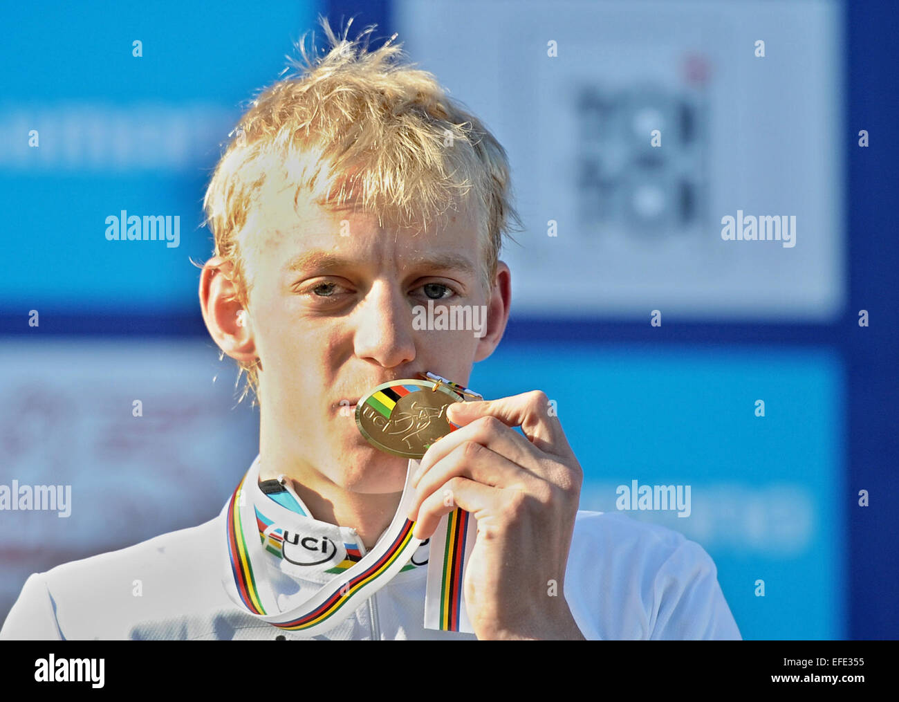 Winner Michael Vanthourenhout of Belgium kisses his medal after the U23 ...