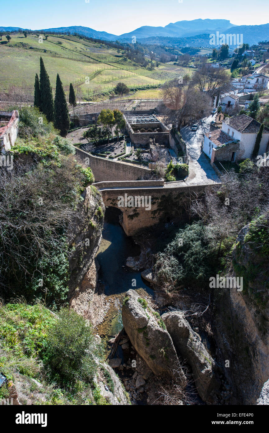 The Arab Bridge and Arab baths in Ronda, Andalusia, Spain Stock Photo ...