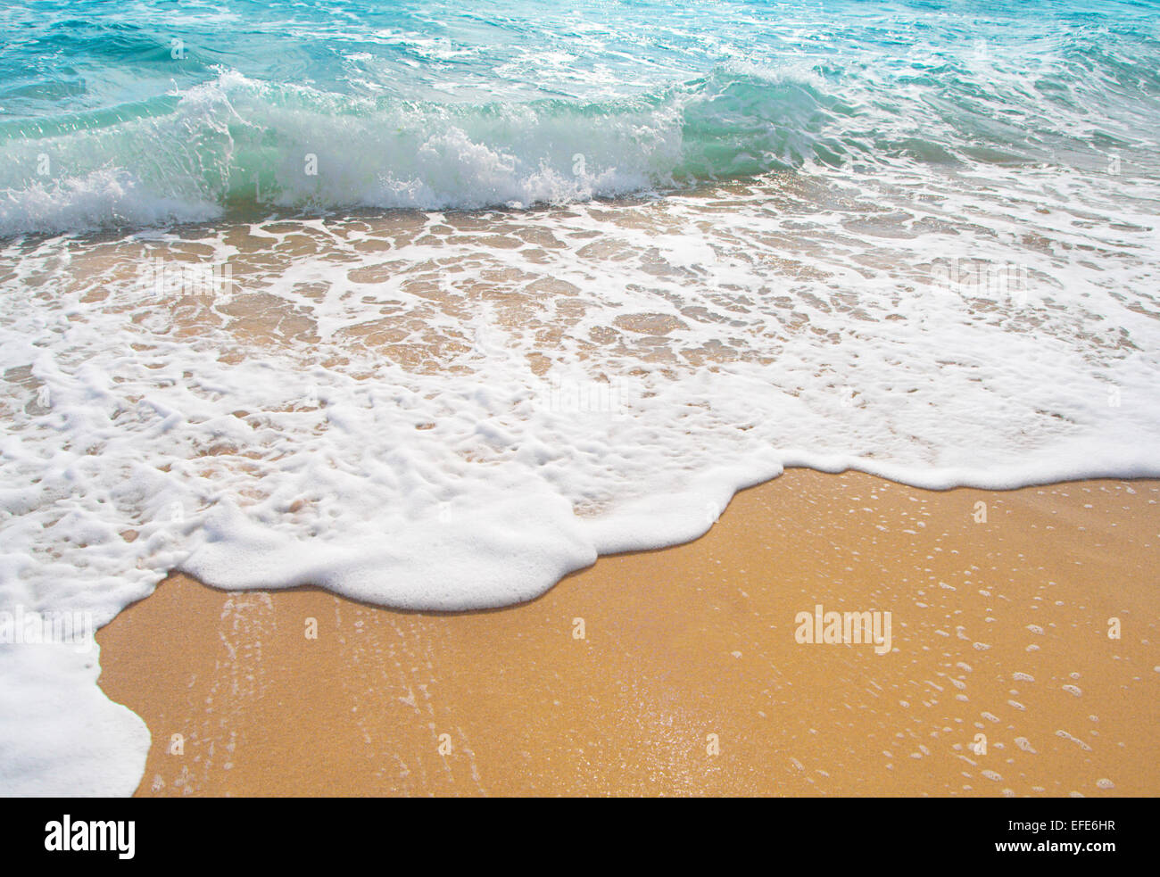 sand and ocean wave Stock Photo - Alamy