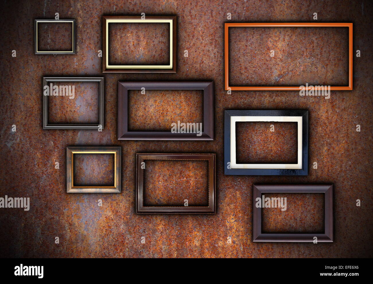 rusty wall full of empty frames ready for your design or message Stock ...