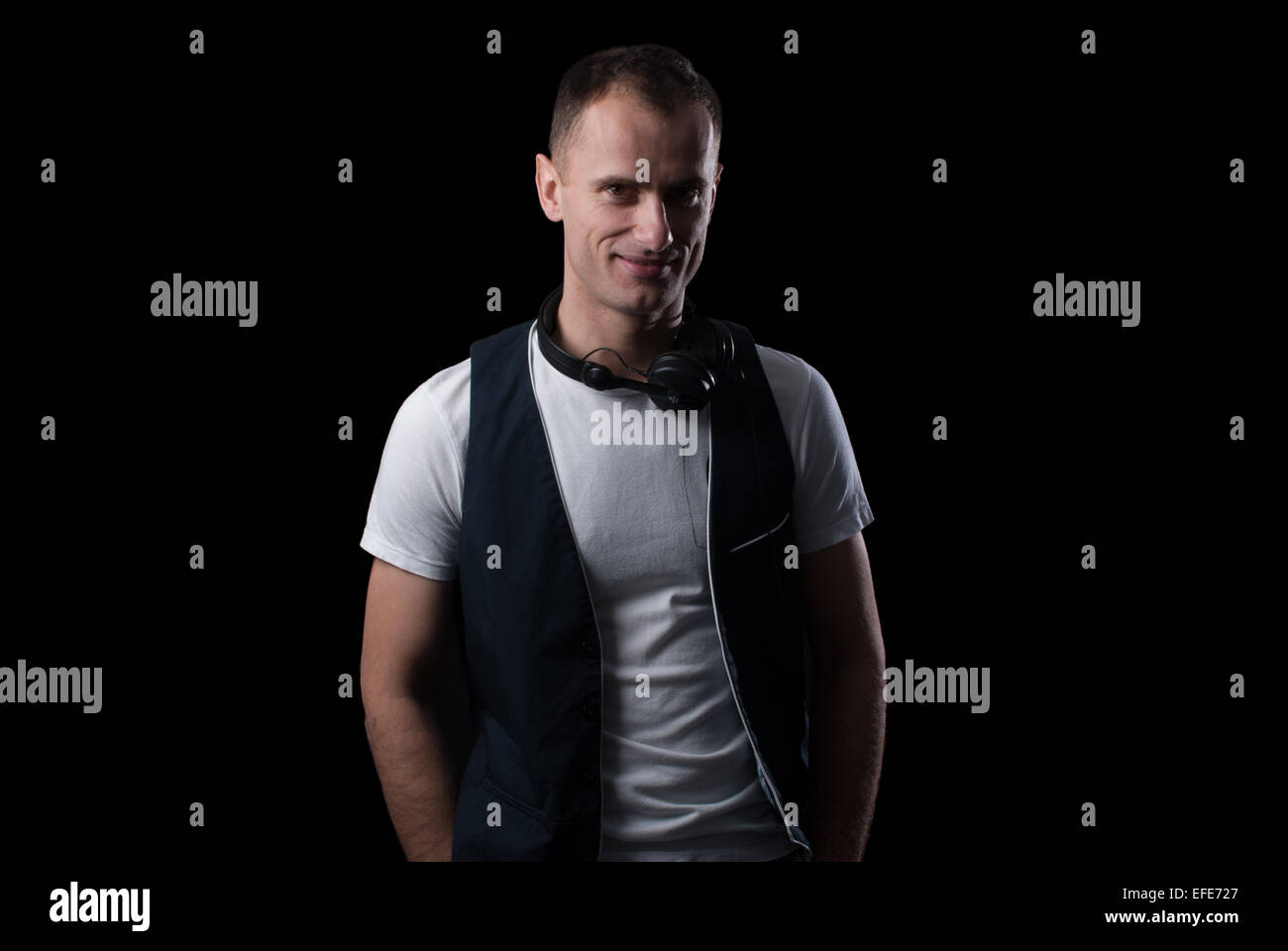 dj with headphones on white background Stock Photo - Alamy