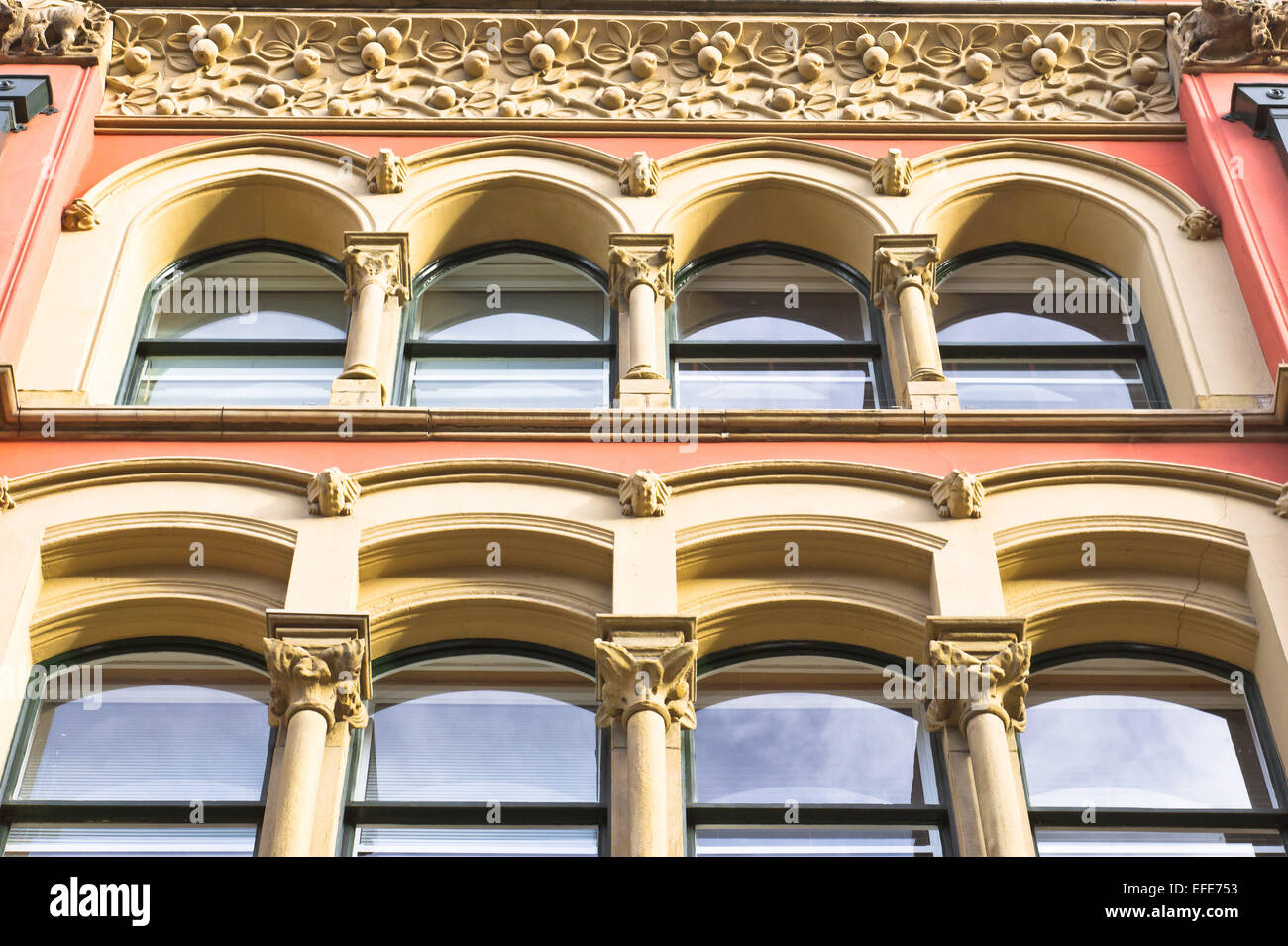 Arch windows on a well maintained building in the UK Stock Photo - Alamy
