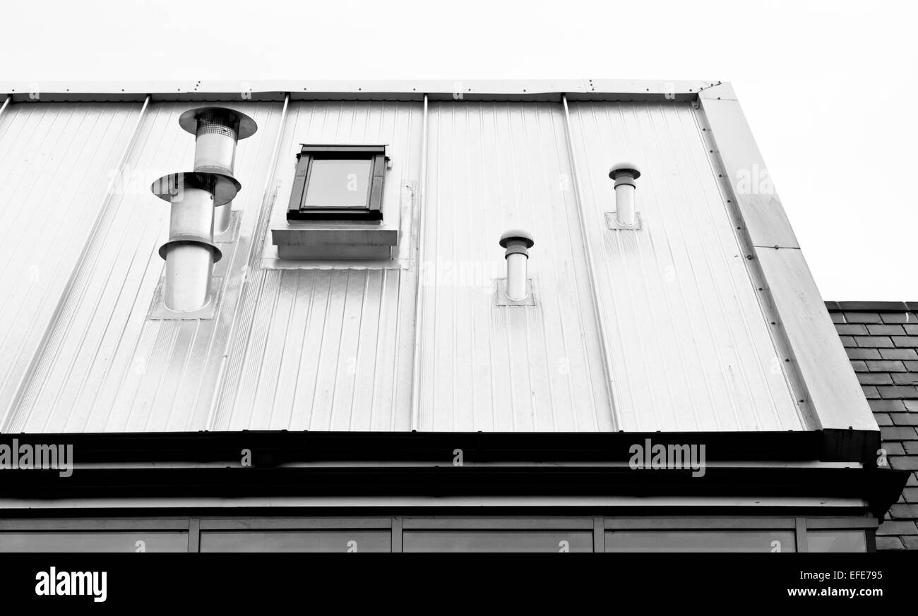 Modern roof with skylight and ventilation outlets Stock Photo - Alamy