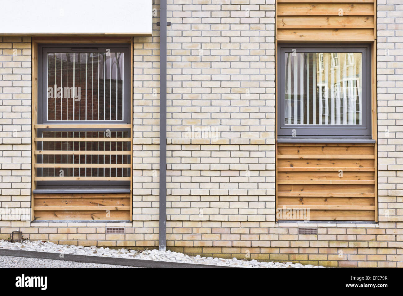 Windows on the outside of a new build apartment Stock Photo - Alamy