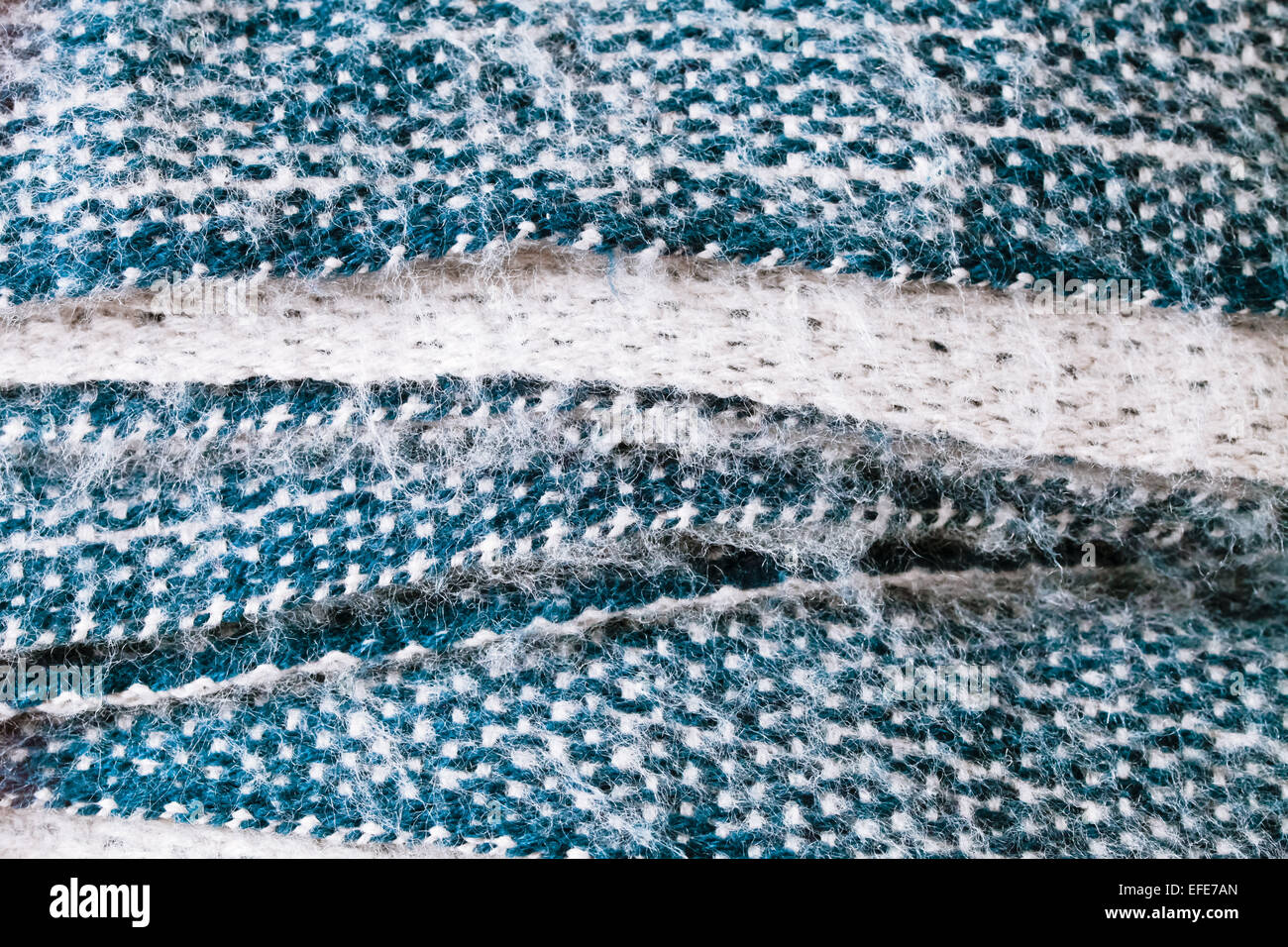 Folded blue and white scarf Stock Photo - Alamy