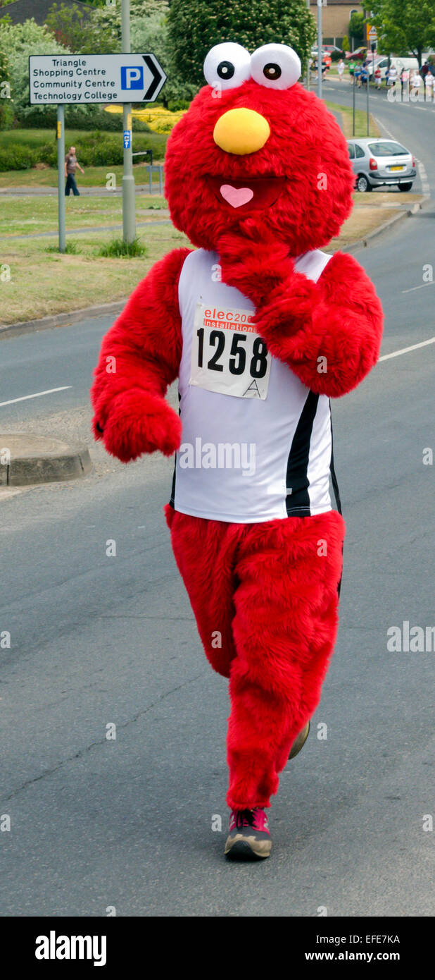 Annual charity run for Macmillan charity fun run in a costume Essex, UK ...