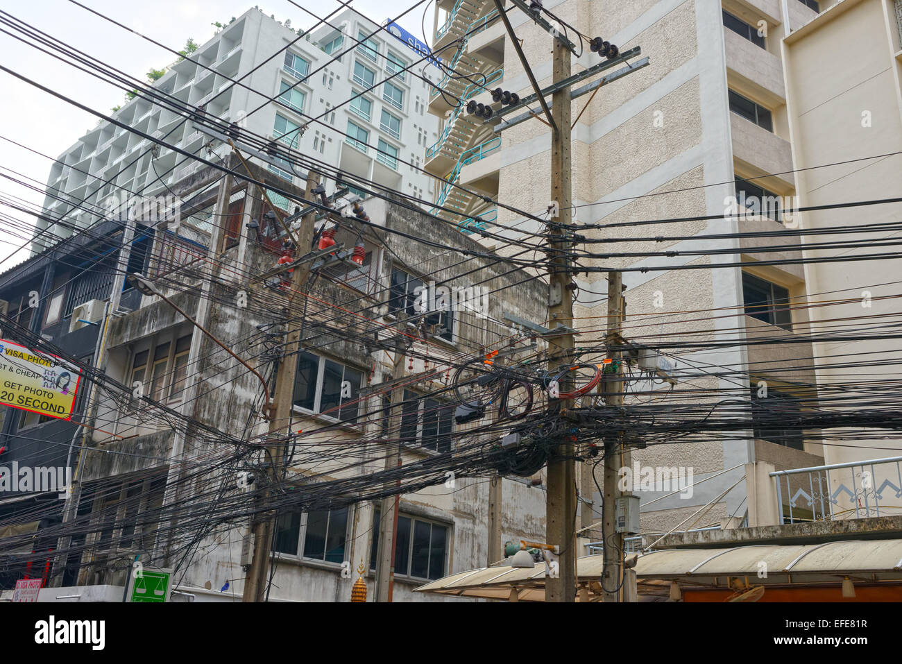 Power telecoms telephone telecommunication electricity cables hanging ...