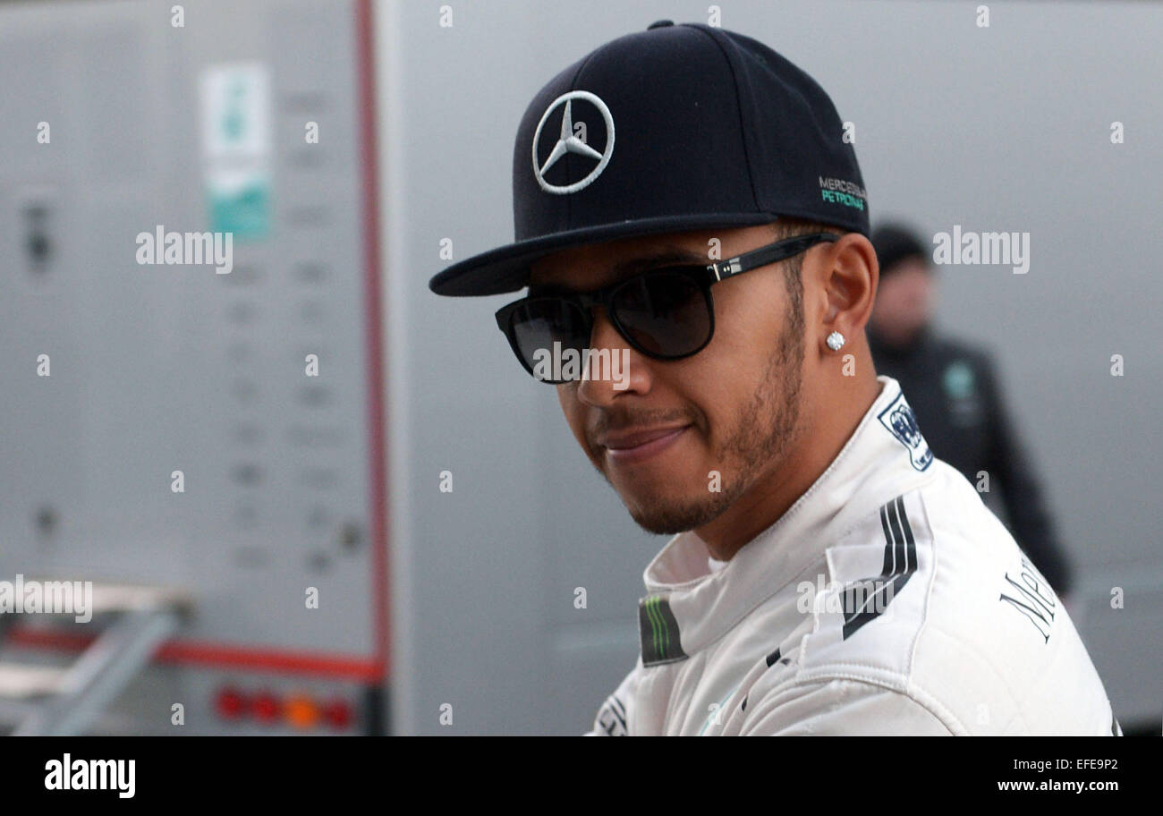 British Formula One driver Lewis Hamilton of Mercedes walks through the ...