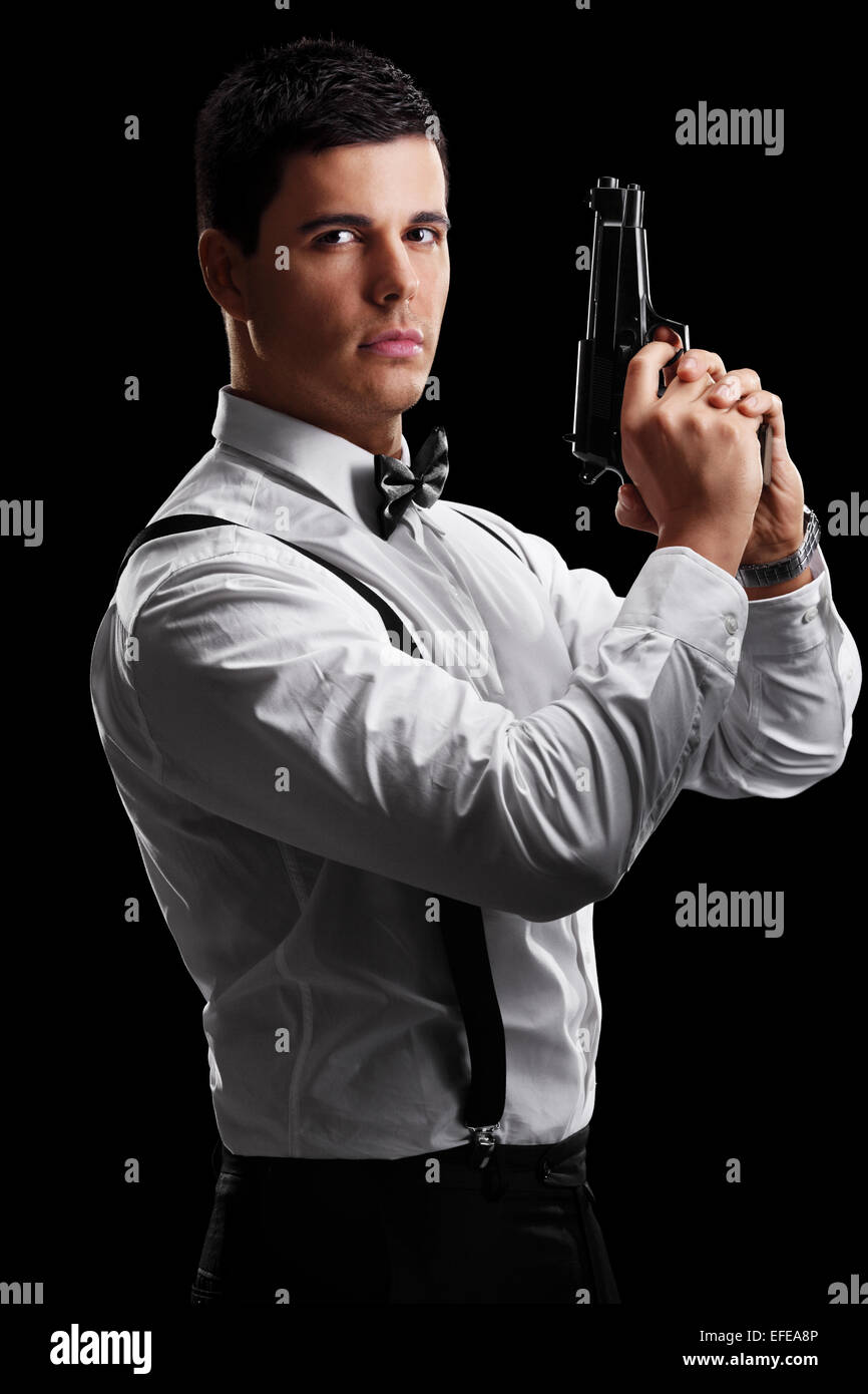 Policeman holding weapon hi-res stock photography and images - Alamy