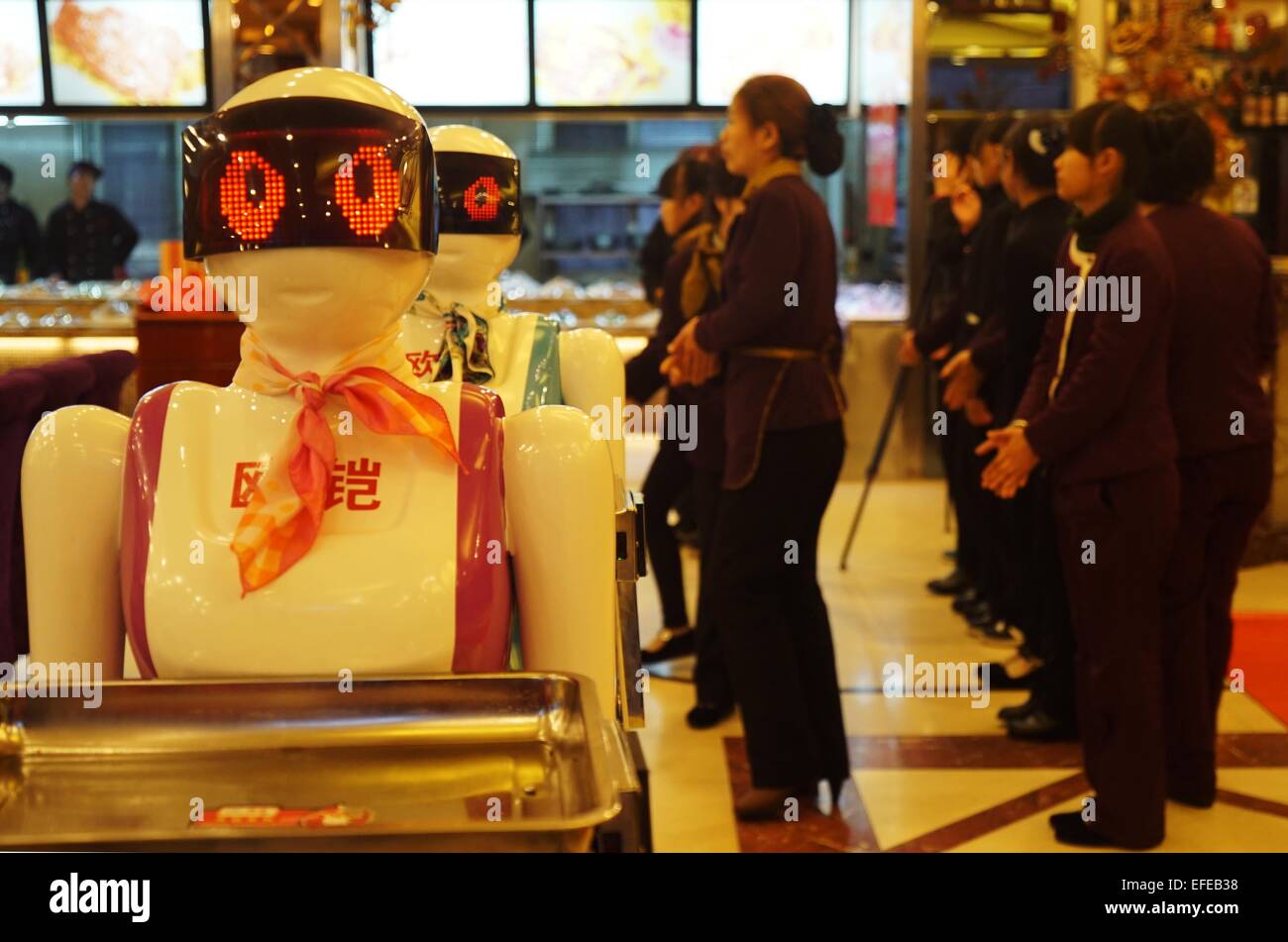 Nanchang, China's Jiangxi Province. 2nd Feb, 2015. Two robot waiters ...