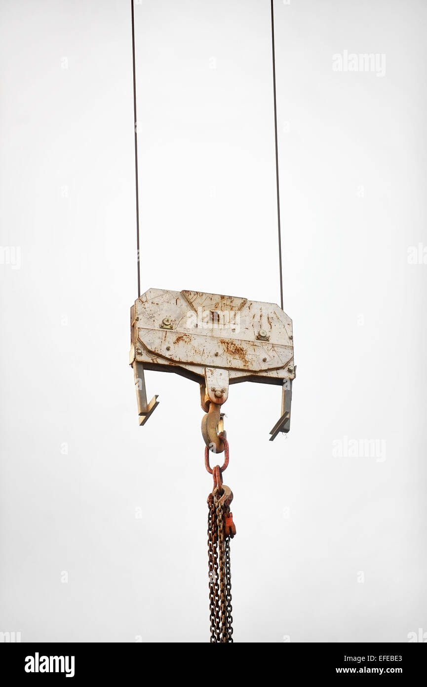 Industrial crane hook on a white background Stock Photo - Alamy