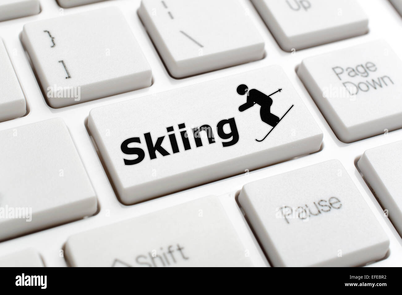 Skiing and symbol key on keyboard Stock Photo - Alamy