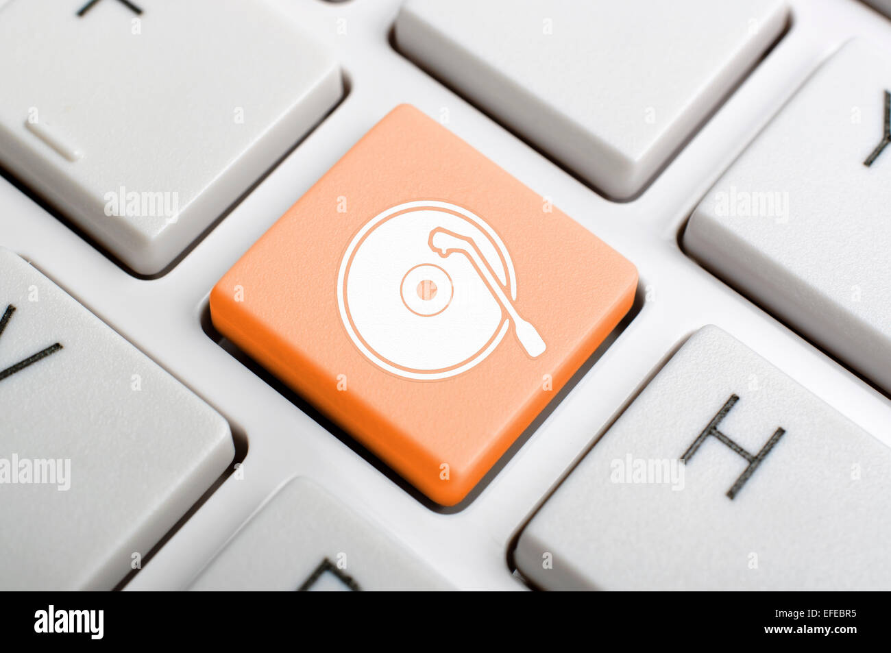 Gramophone record key on keyboard Stock Photo - Alamy